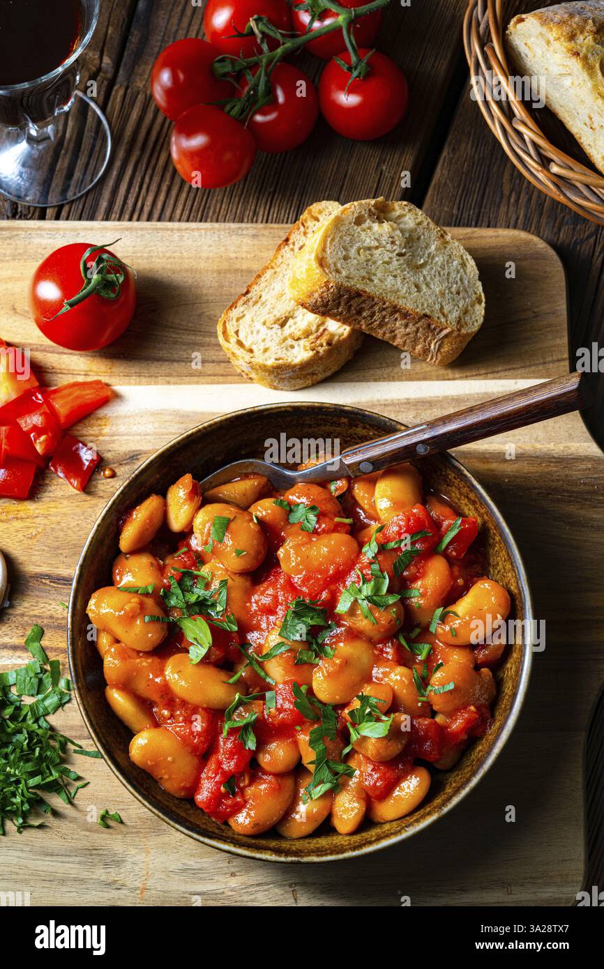 Rustic giant beans with fresh tomato sauce Stock Photo - Alamy