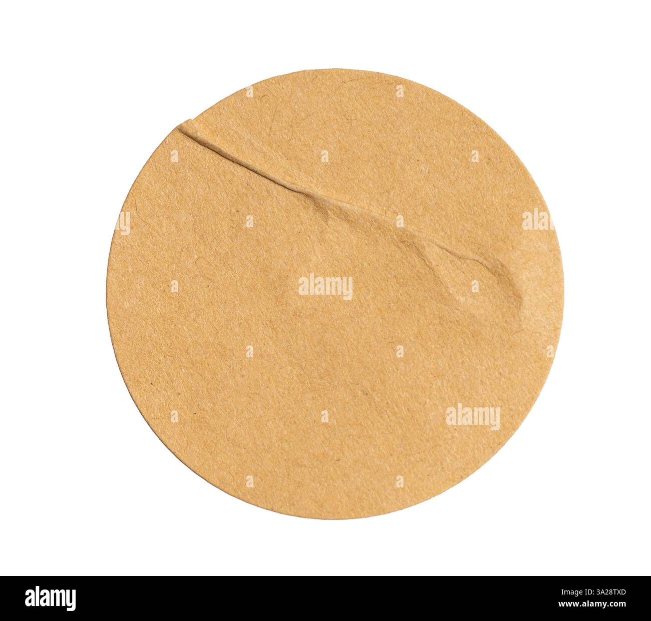 Round crumpled sticker made of recycled craft brown paper with ...
