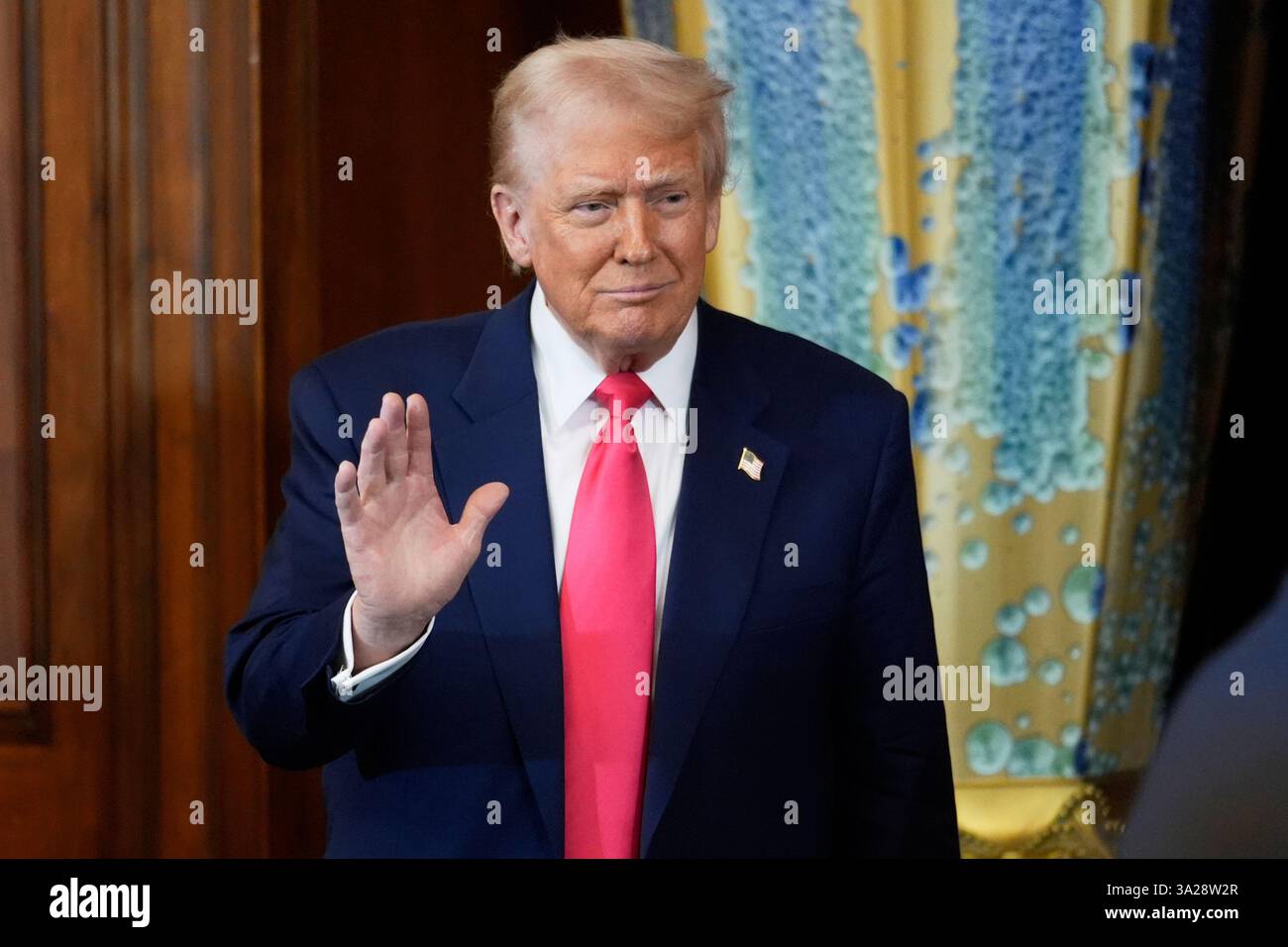 President Donald Trump arrives at the annual St. Patrick's Day luncheon ...