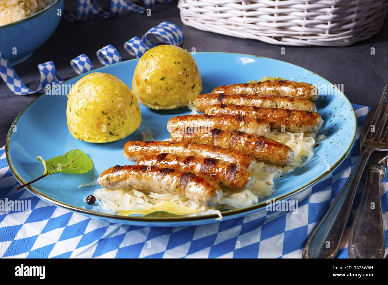 Nuremberg bratwurst with sauerkraut and dumplings Stock Photo - Alamy