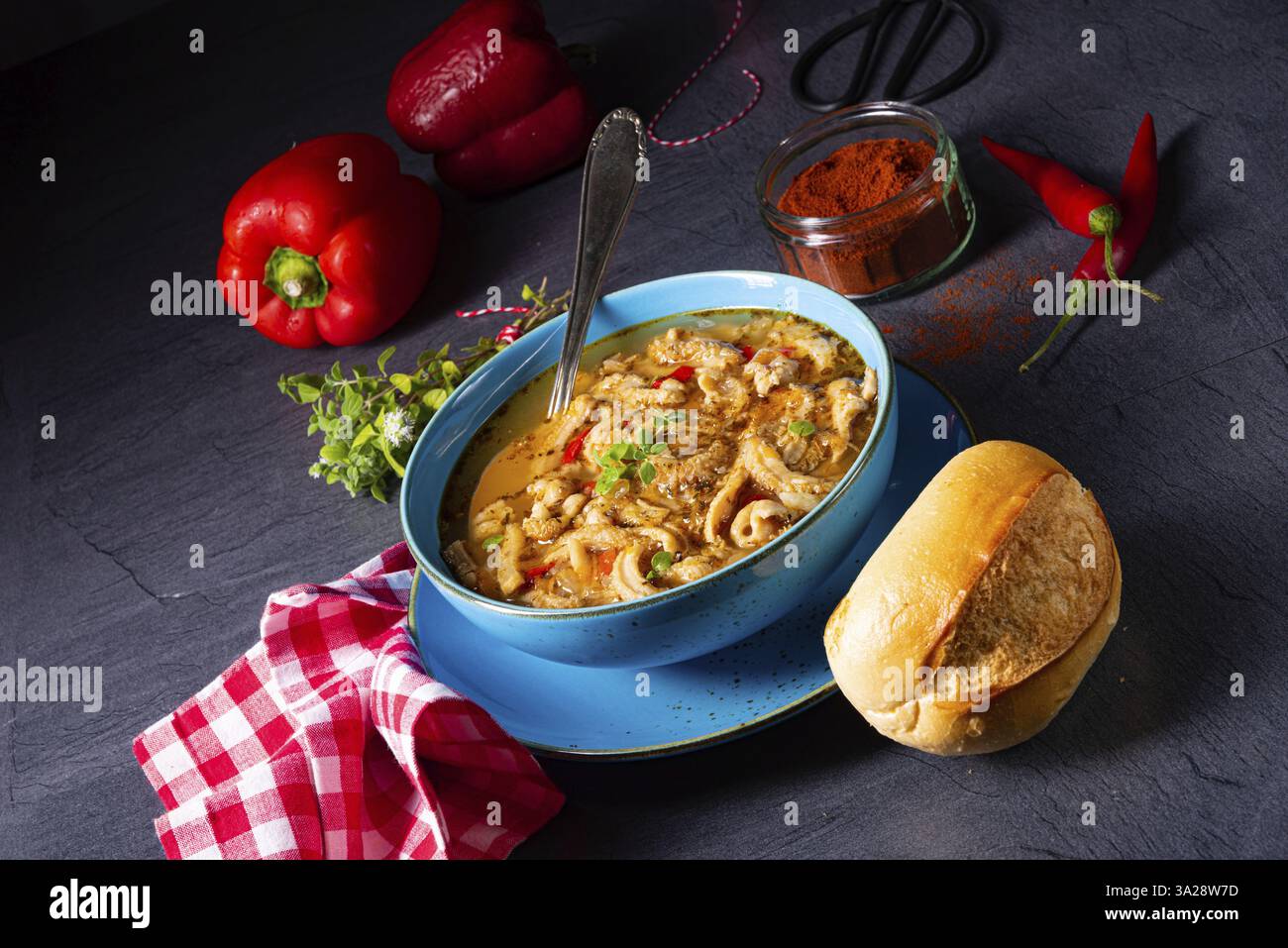 Flaczki fresh and spicy tripe soup with herbs Stock Photo - Alamy
