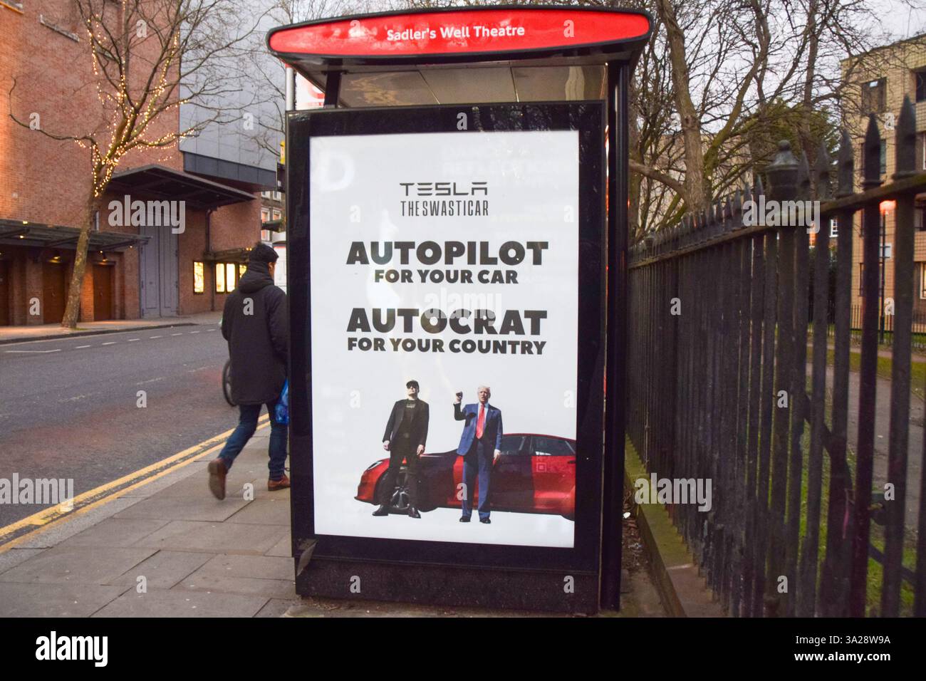 London, UK. 12th March 2025. A mock advert for 'Tesla The Swasticar ...