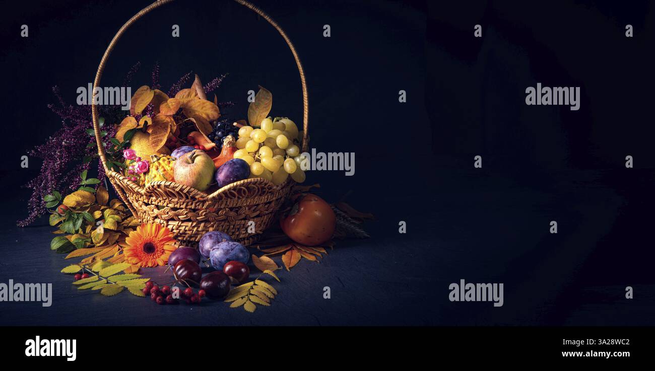 Autumn cornucopia in a round basket Stock Photo - Alamy