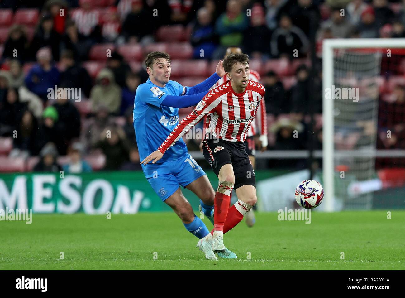 Preston North End's Ryan Ledson in action with Sunderland's Dan Neil ...