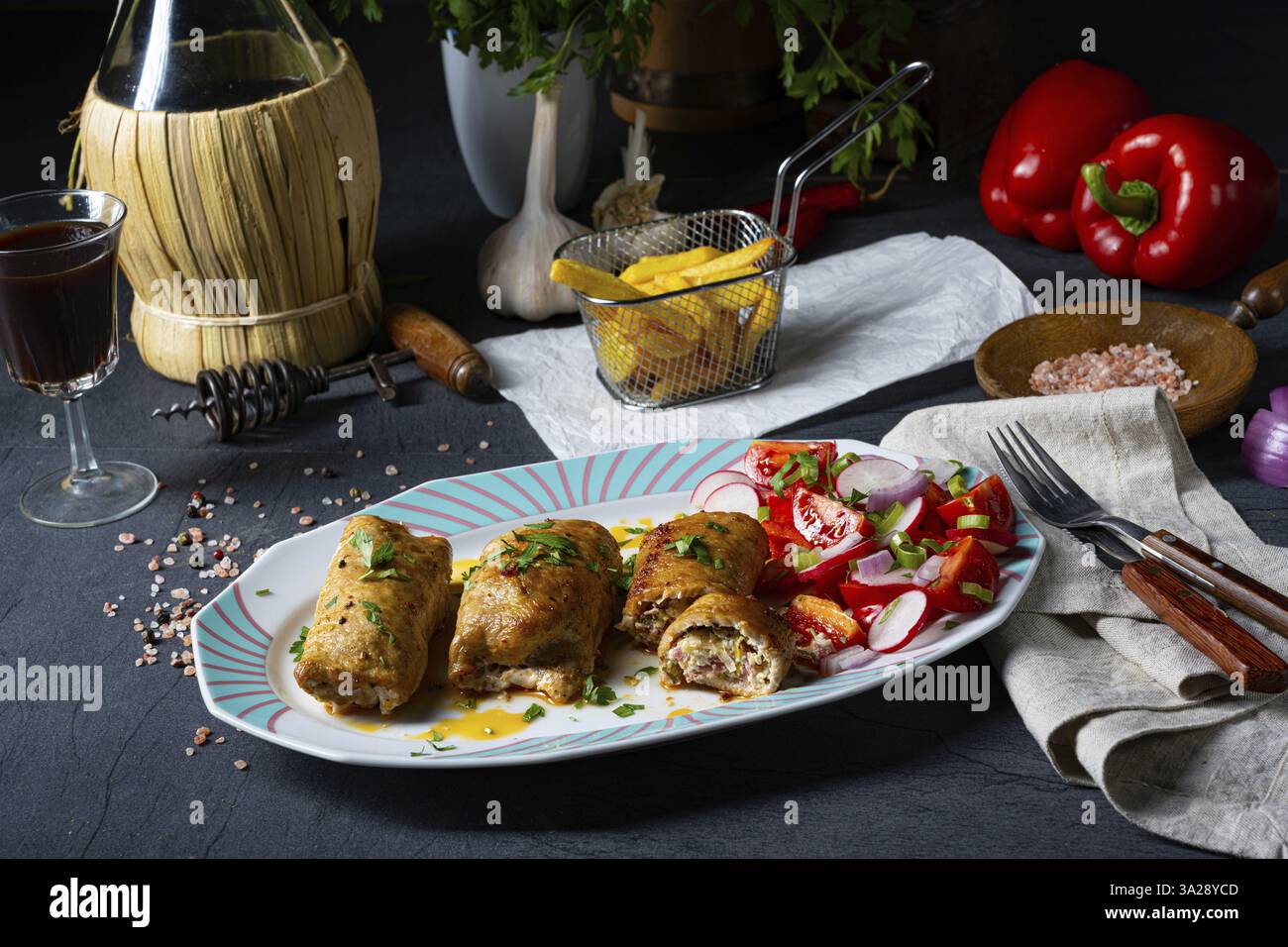 Roast pork vegetable roulade with salads Stock Photo - Alamy