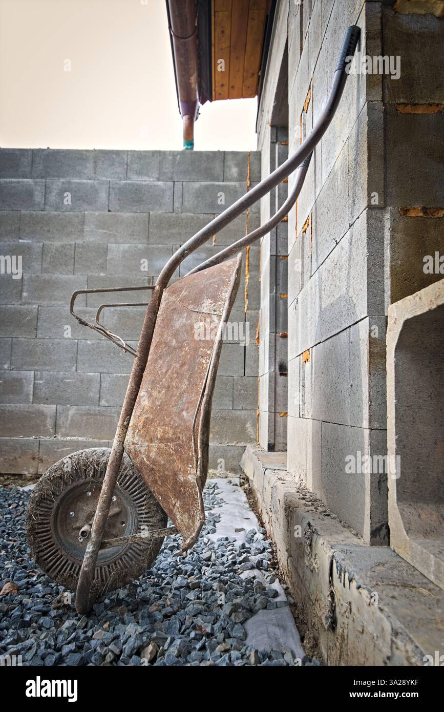 Construction of unfinished house made of blocks. Building site in the ...