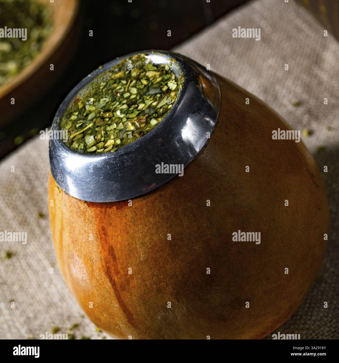 Prepare yerba mate with calabash and bombilla Stock Photo - Alamy