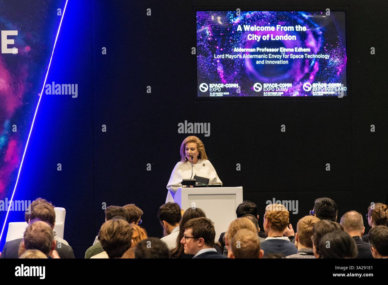 Professor Emma Edhem introducing and welcoming an audience at the ...