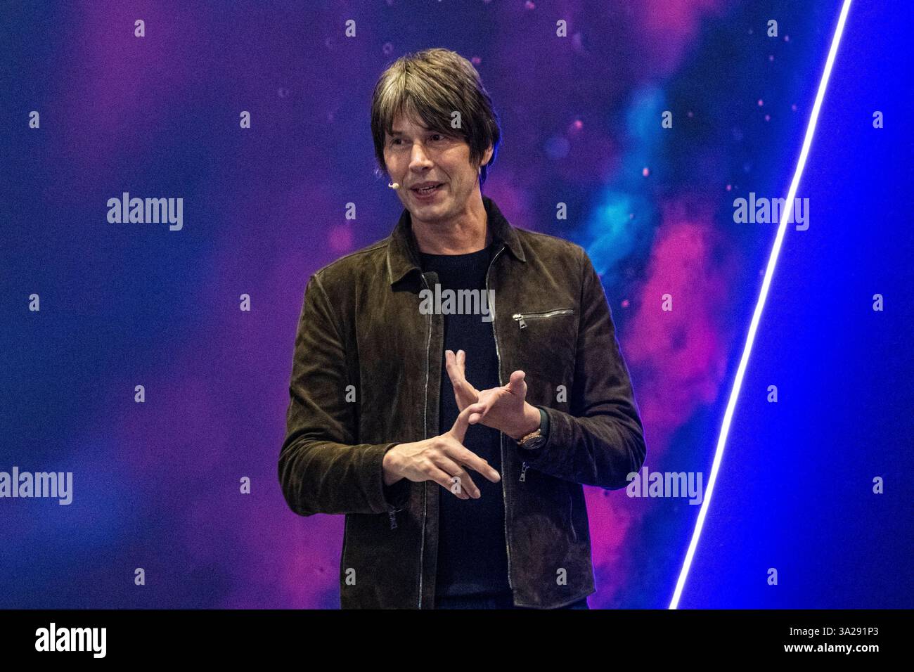 Professor Brian Cox giving a talk during a presentation discussing the ...