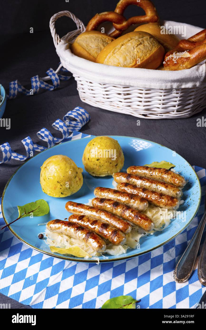 Nuremberg bratwurst with sauerkraut and dumplings Stock Photo - Alamy