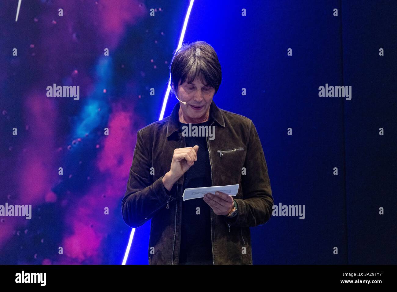 Professor Brian Cox giving a talk during a presentation discussing the ...