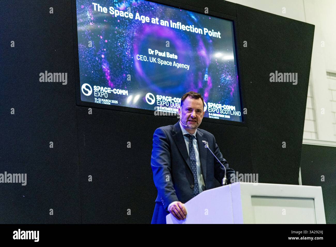 Dr Paul Bate, CEO of UK Space Agency, giving a talk and presentation at ...