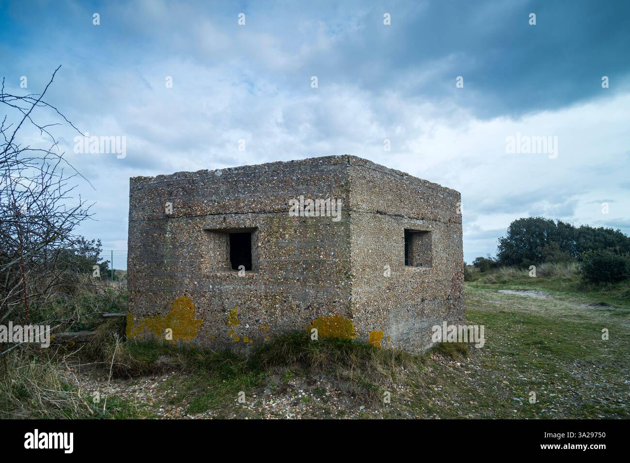 concrete fortified wartime pill box building Stock Photo - Alamy