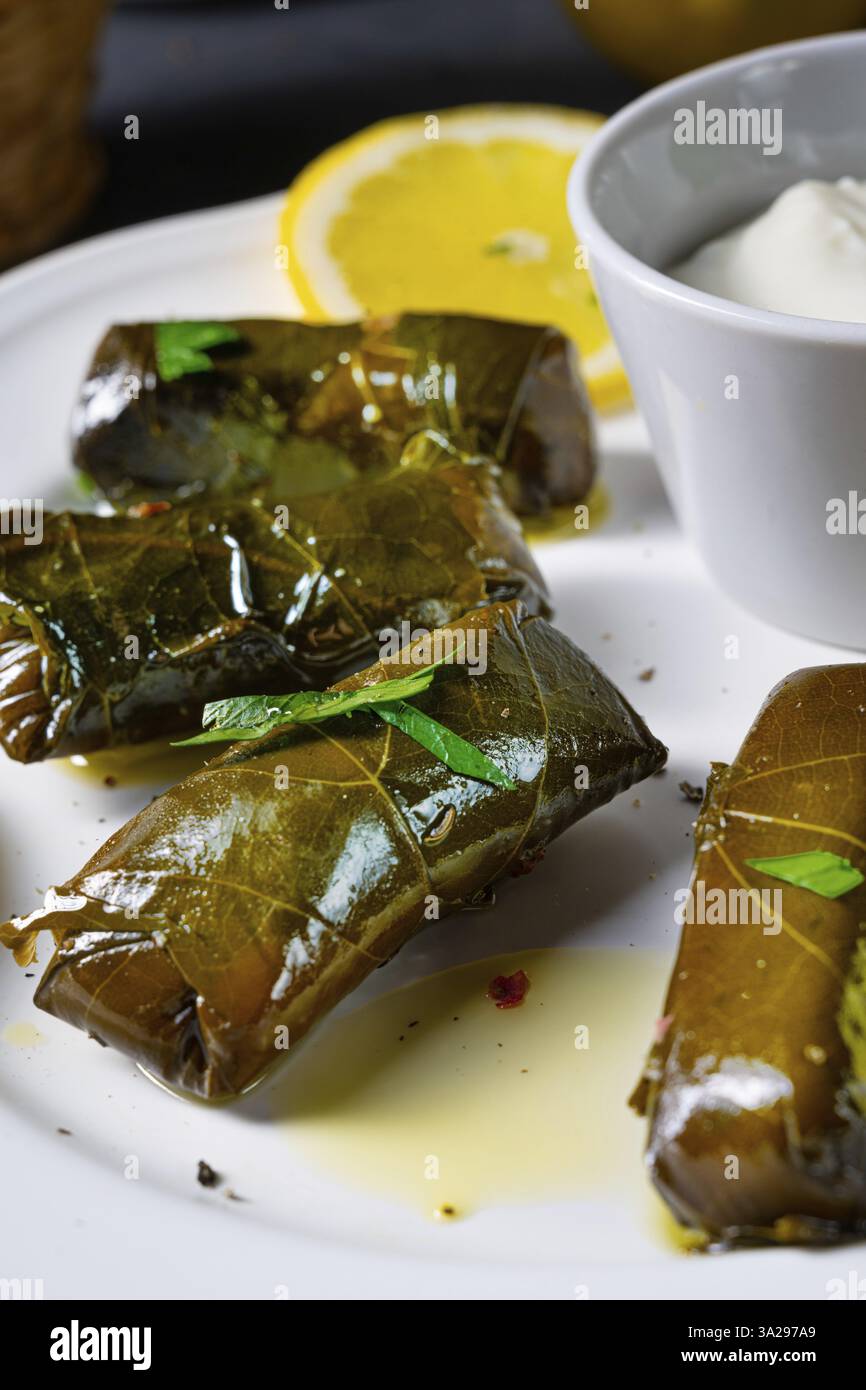 Dolmades stuffed grape leaves the Greek way Stock Photo - Alamy