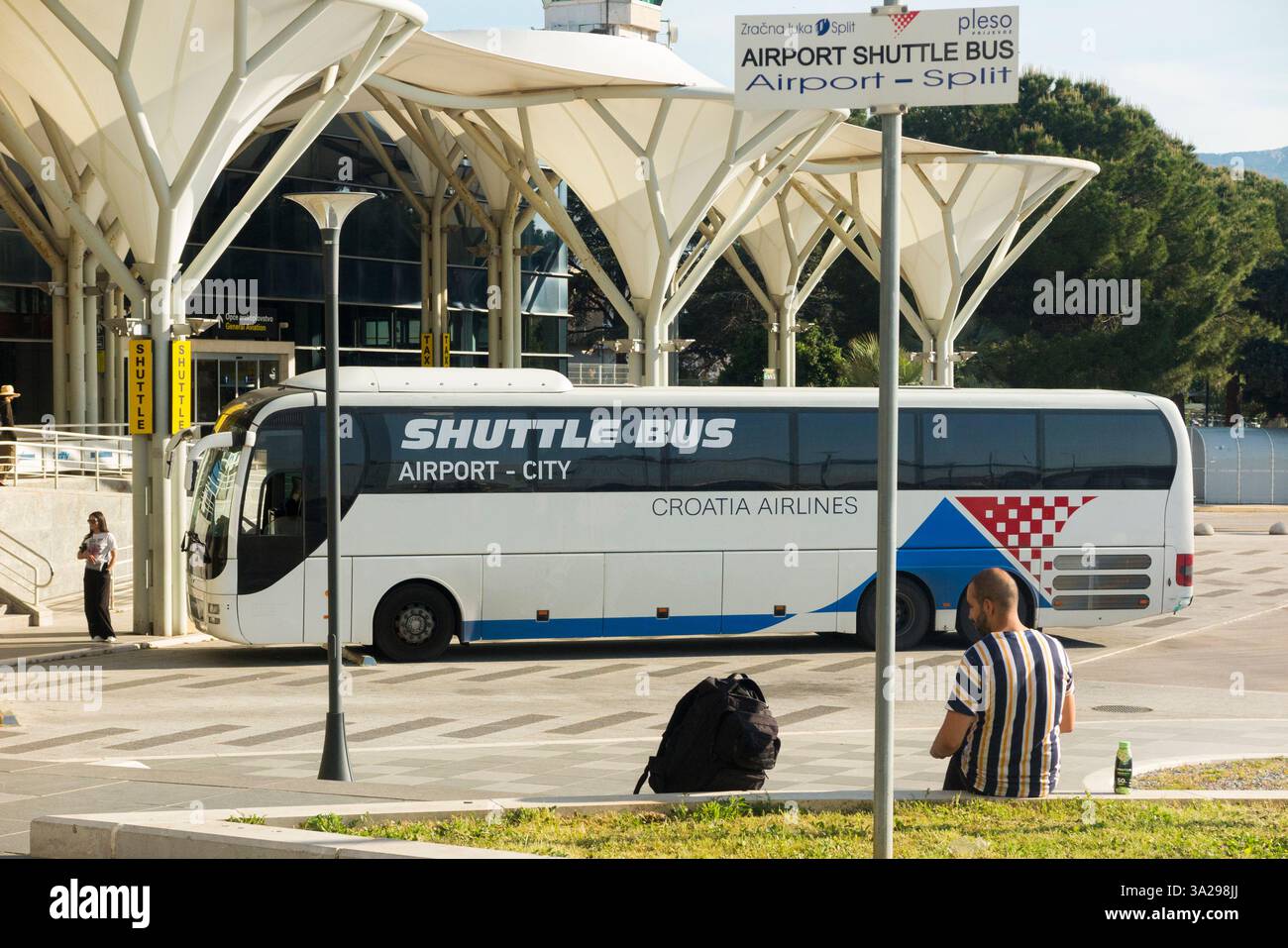 Tourist passenger shuttle bus at Split Airport, in front of the main ...