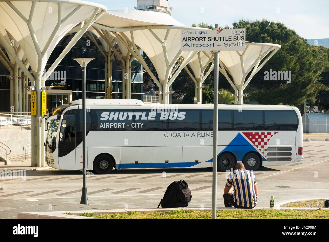 Tourist passenger shuttle bus at Split Airport, in front of the main ...