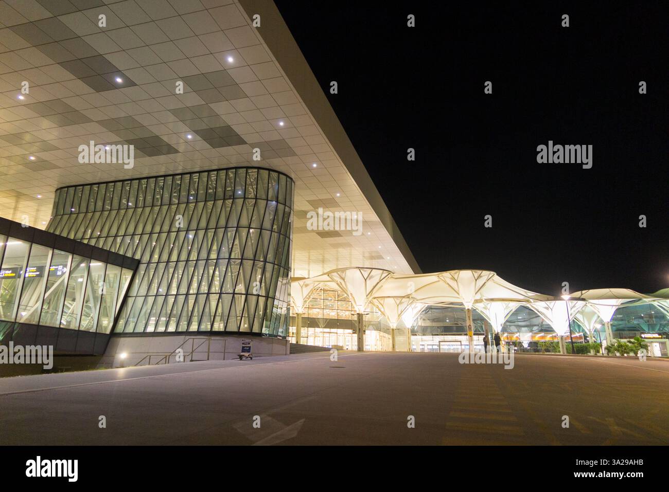 Split Airport at night and illuminated; front facade of the main ...
