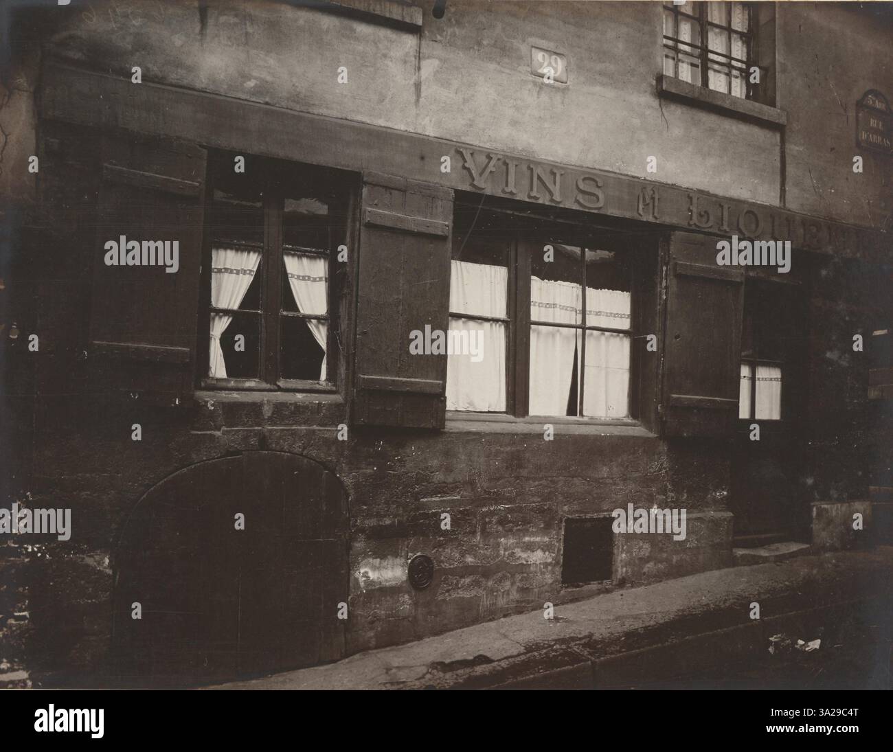 Atget’s photograph shows a wine shop, reflecting the importance of wine ...