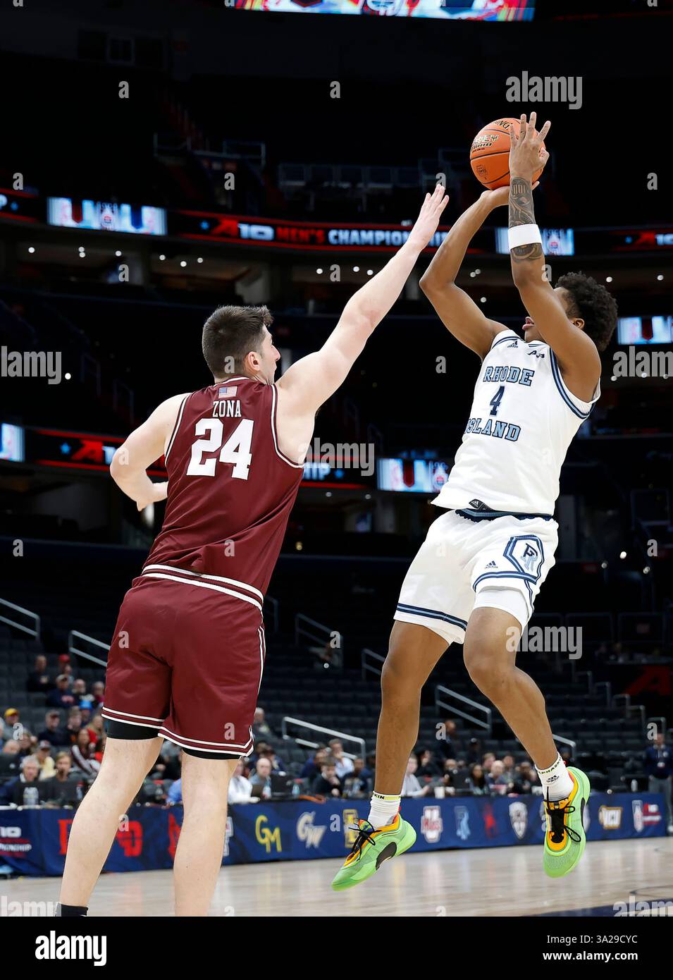 March 12, 2025: Rhode Island Rams Guard (4) Cam Estevez puts up a shot ...