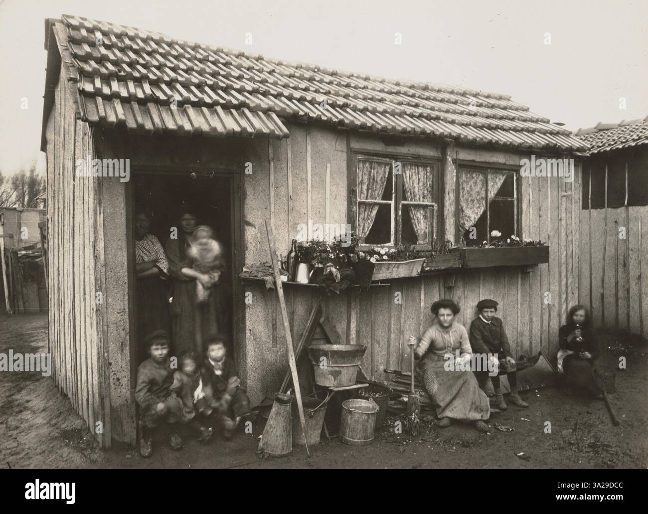 Atget’s untitled photograph features a simple street scene in Paris ...