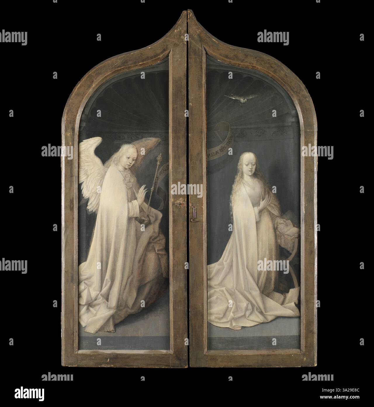 This closed version of a triptych by Adriaen Isenbrandt presents The Annunciation, Adoration of ...