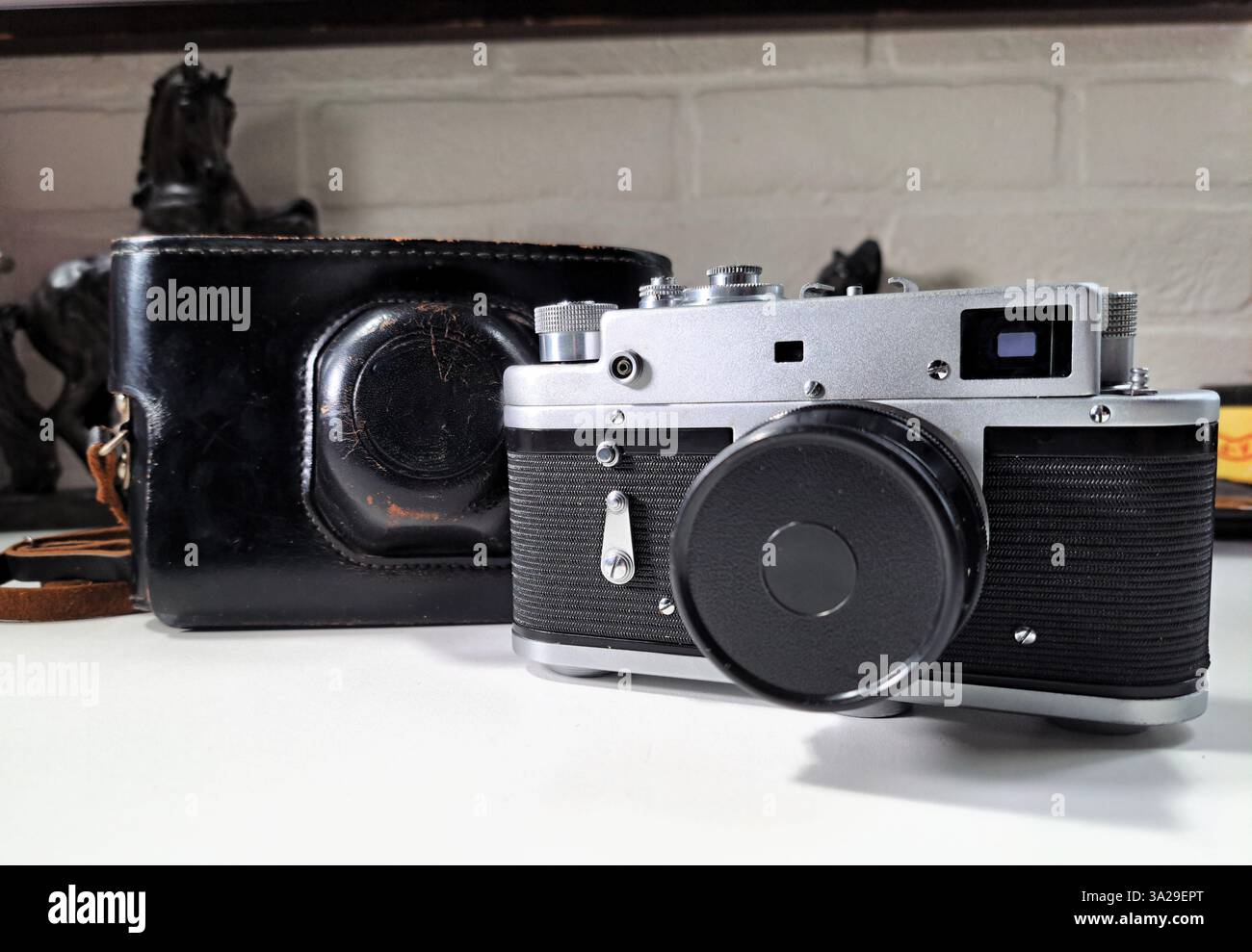 A vintage 35mm analogue film rangefinder camera Stock Photo - Alamy