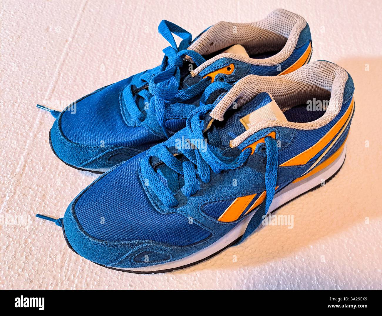 Blue fitness shoes orange hi-res stock photography and images - Alamy