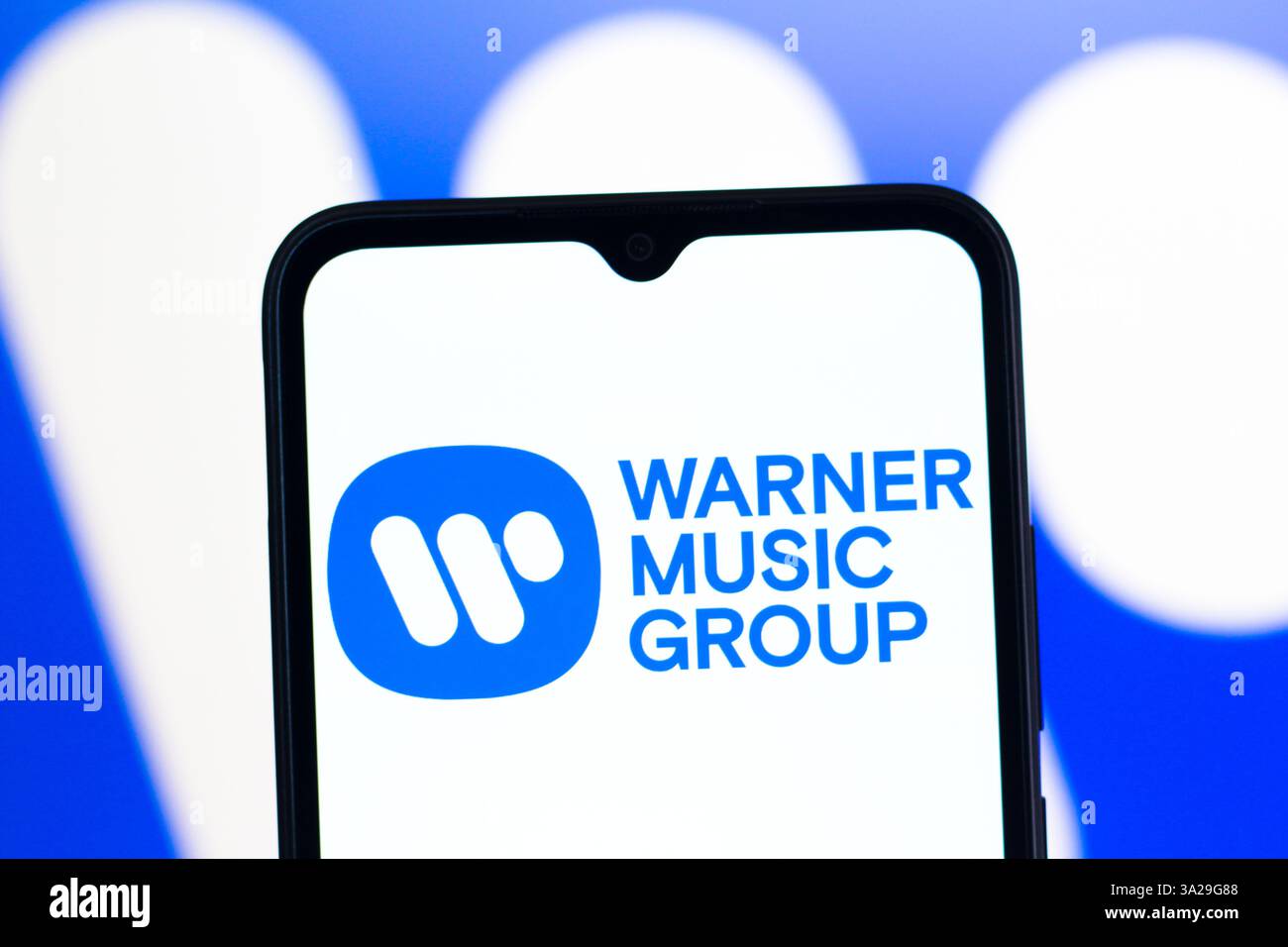 In this photo illustration, the Warner Music Group (WMG) logo is seen ...