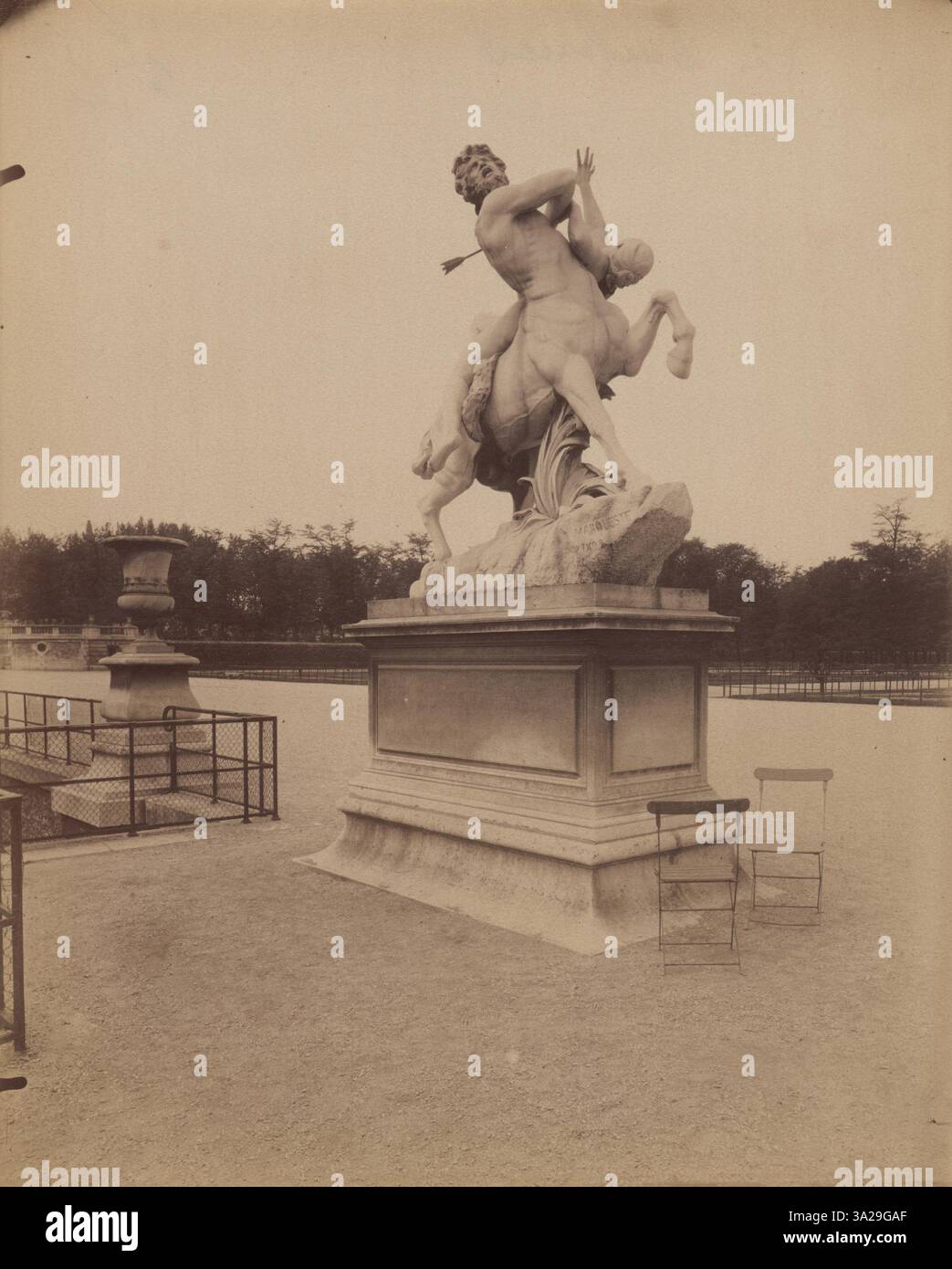A photograph capturing the Tuileries Gardens in Paris, highlighting the ...