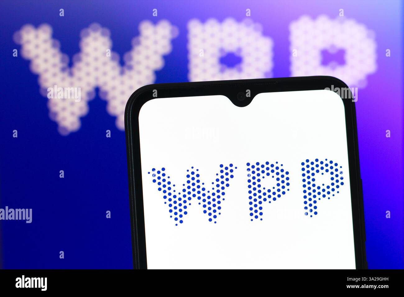 In this photo illustration, the WPP Group logo is seen displayed on a ...
