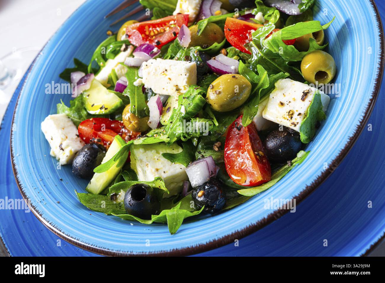 Rustic Greek salad with feta cheese Stock Photo - Alamy