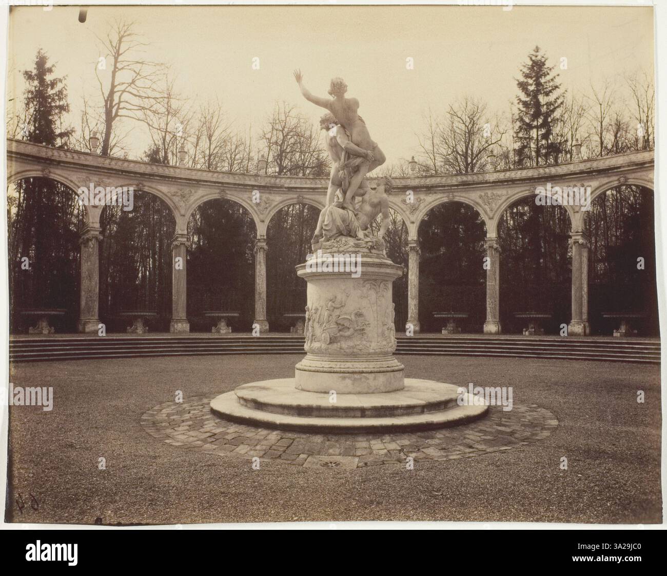 This photograph captures the Bosquet de la Colonnade, a formal garden ...