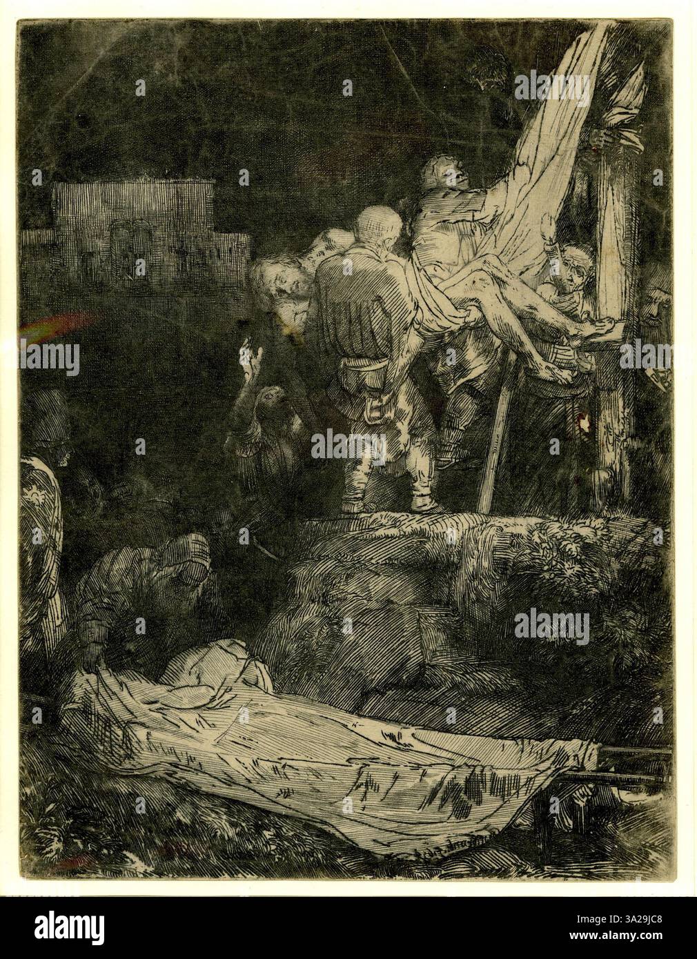 An etching by Rembrandt capturing a figure with remarkable shading and ...