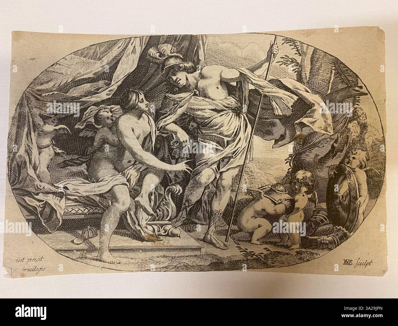 This painting after Simon Vouet depicts Venus seated on a bed, with ...