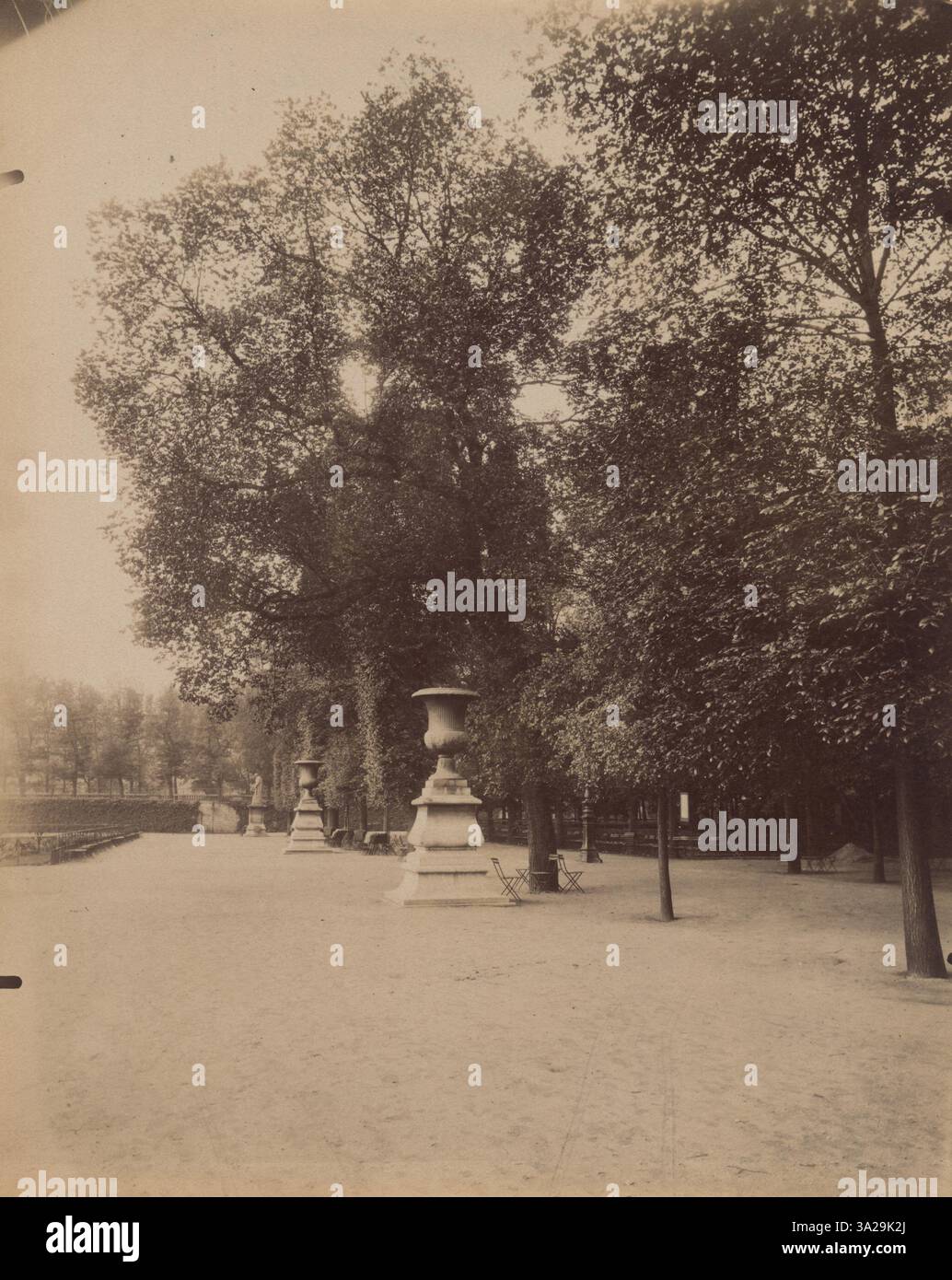 This photograph depicts the Tuileries Gardens, focusing on the ...
