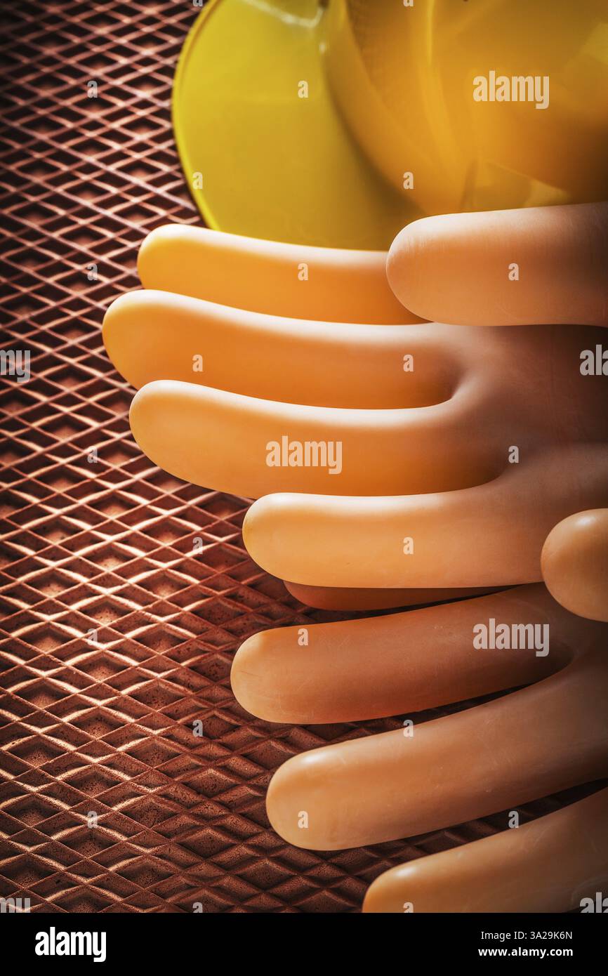 Safety insulating gloves building helmet on dielectric rubber mat Stock ...