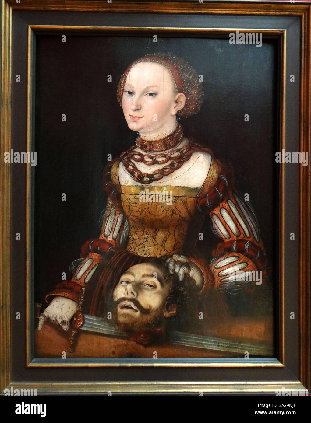 In this dramatic depiction, Judith holds the severed head of Holofernes ...