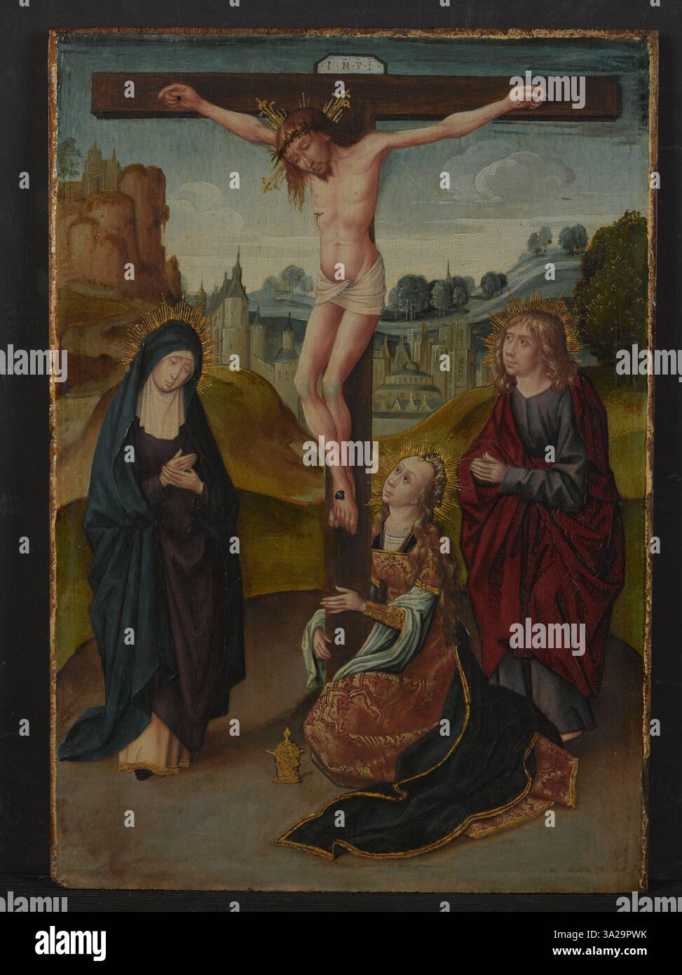 This painting by Cornelis Engebrechtsz. shows the Crucifixion of Christ with Mary, John the ...