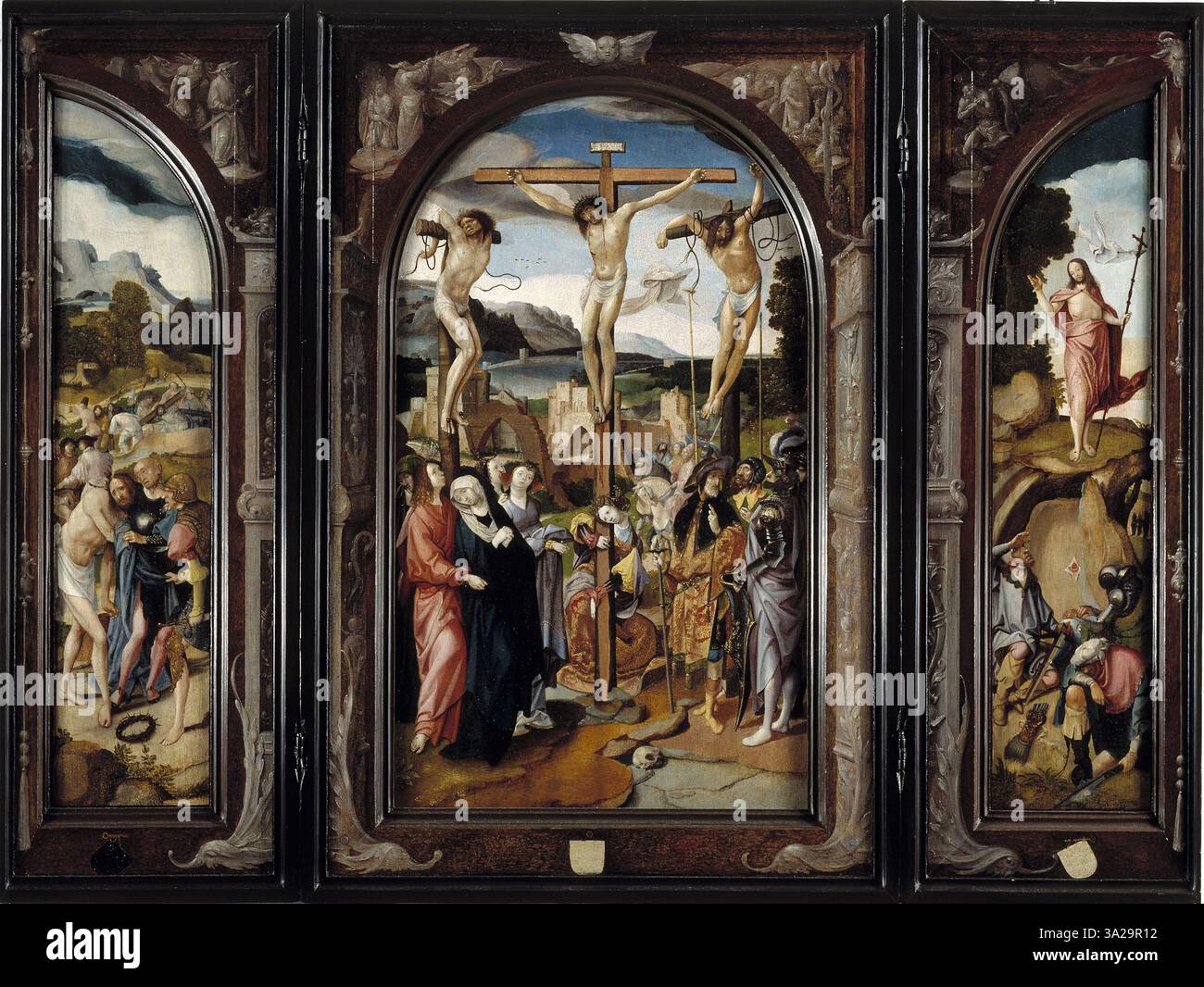 This triptych, created by the workshop of Cornelis Engebrechtsz., depicts the Crucifixion of ...