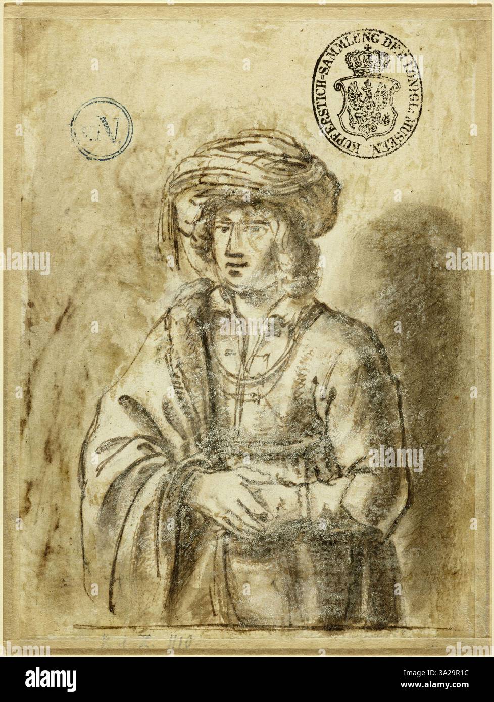 This portrait by Rembrandt depicts a young man wearing a turban ...