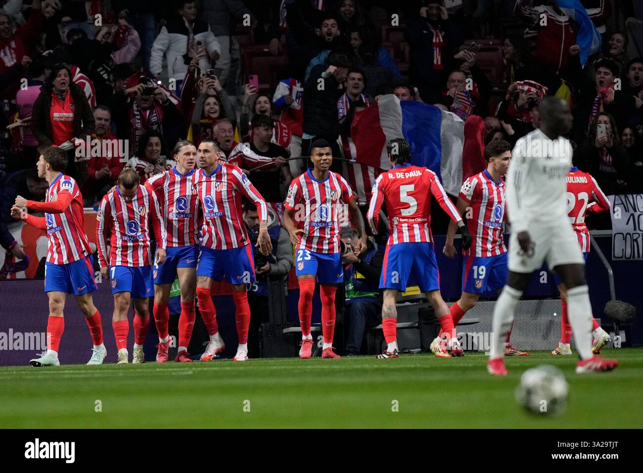 Atletico Madrid players celebrate after a goal during the Champions ...