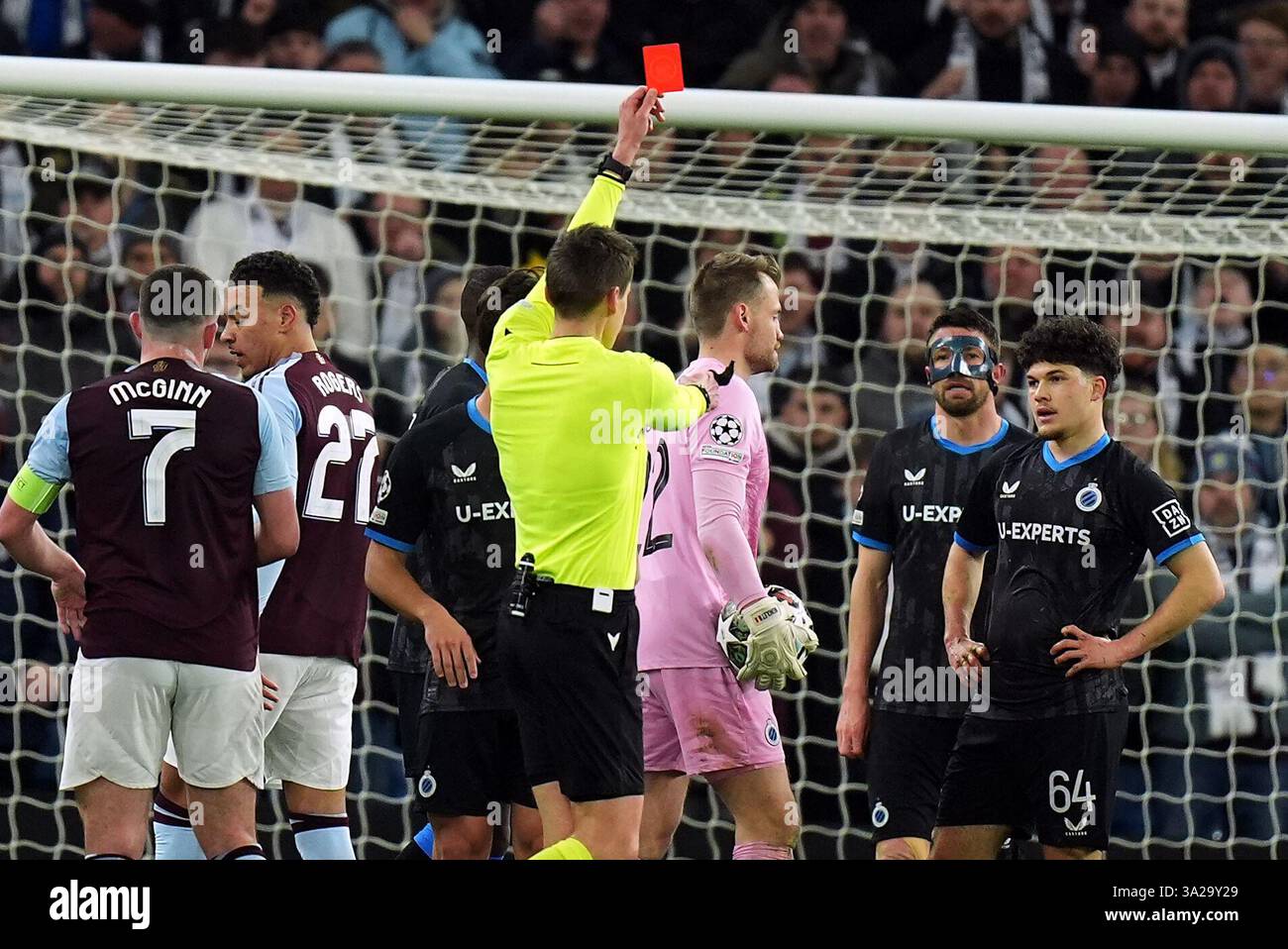 Referee Daniel Siebert shows a red card to Club Brugge's Kyriani Sabbe ...