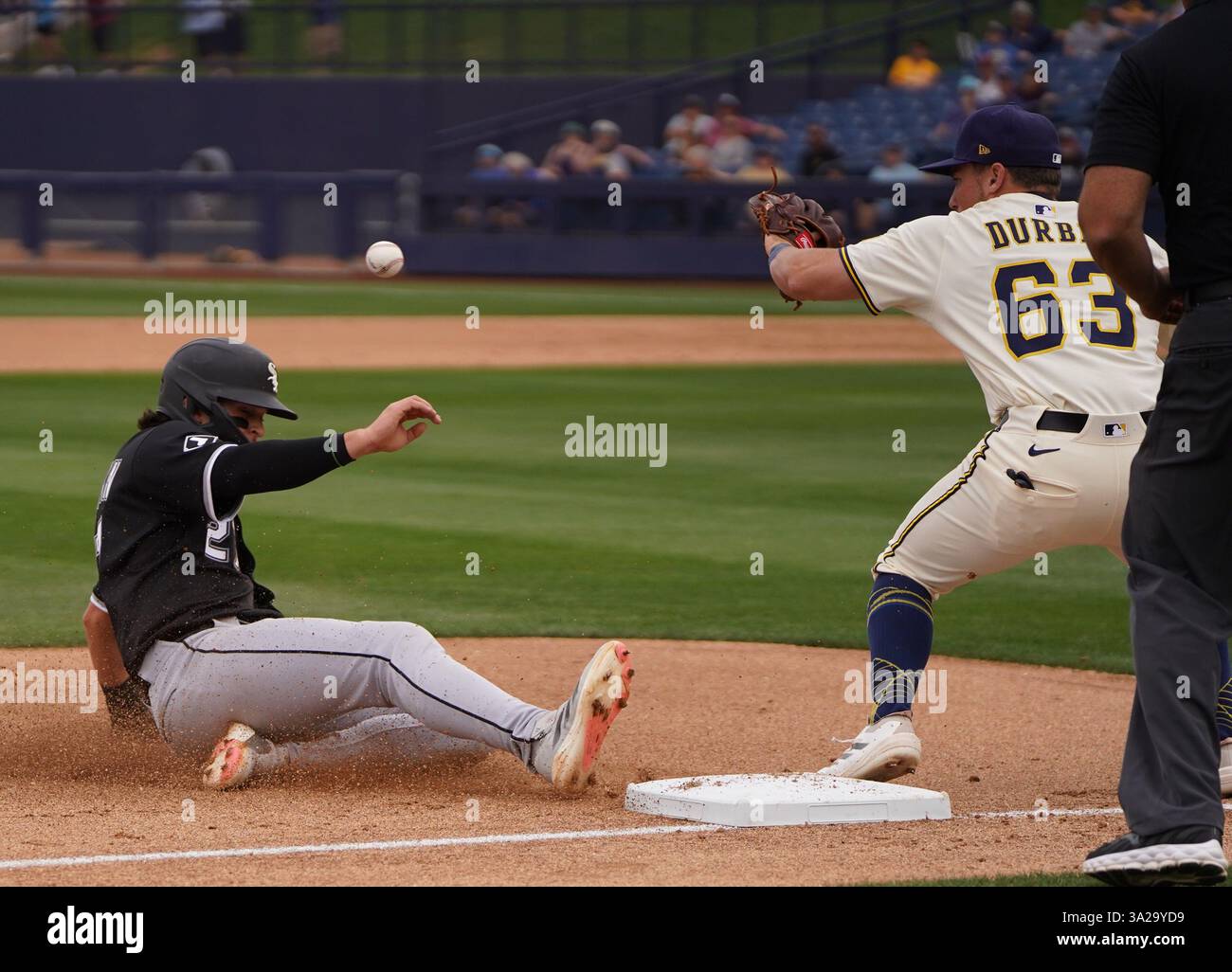 Chicago White Sox shortstop Brooks Baldwin (27) slides into third base ...