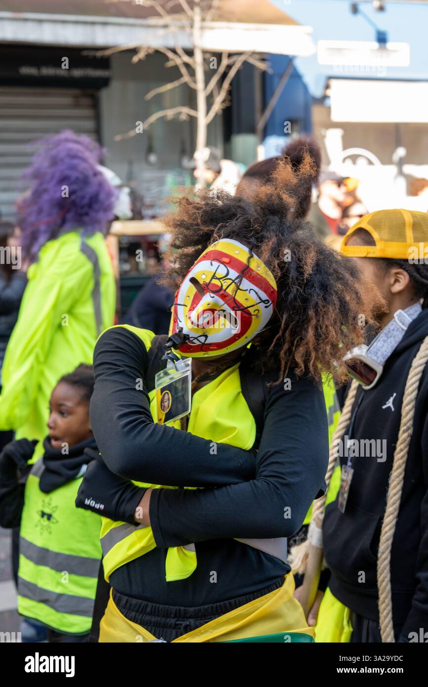 Vibrant masks and colorful costumes fill the streets during the lively ...