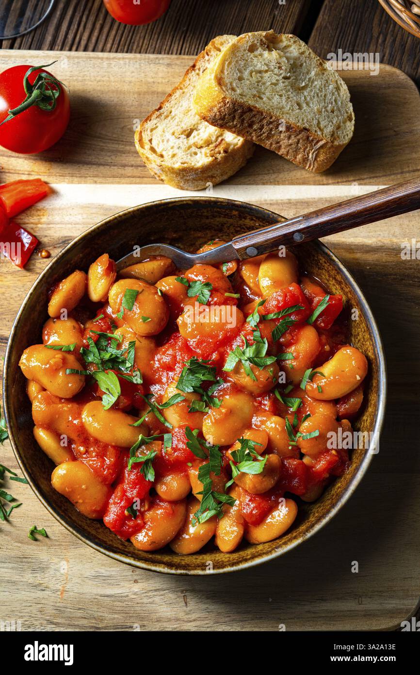 Rustic giant beans with fresh tomato sauce Stock Photo - Alamy