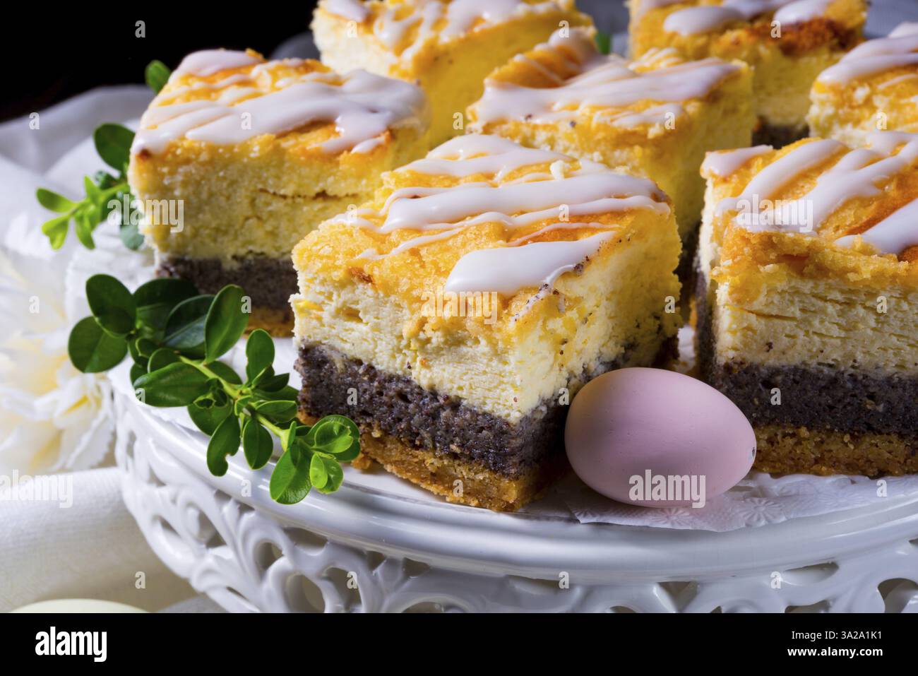Delicious Easter poppy seed cake with white icing Stock Photo - Alamy