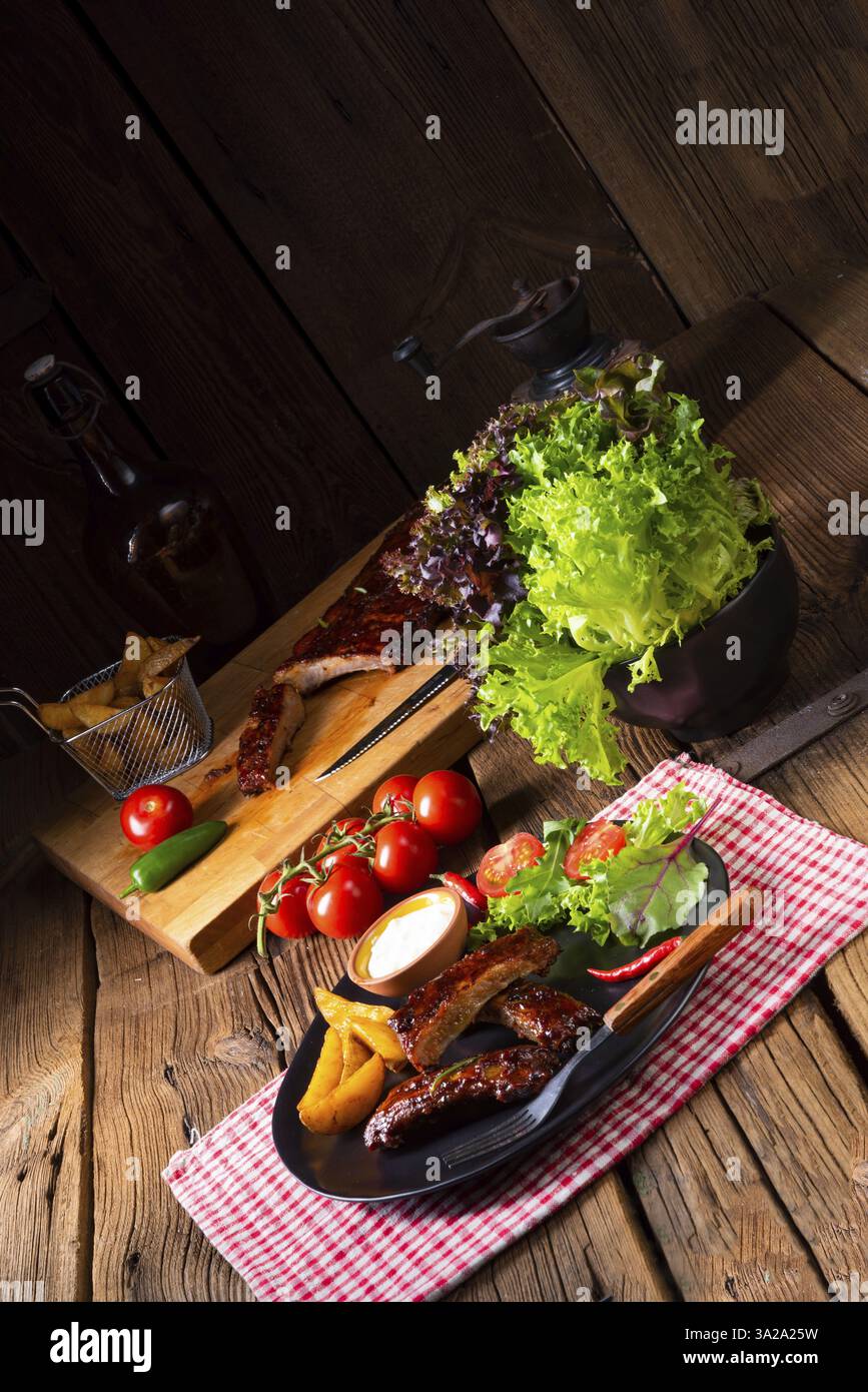 Delicious grilled ribs with barbecue sauce Stock Photo - Alamy