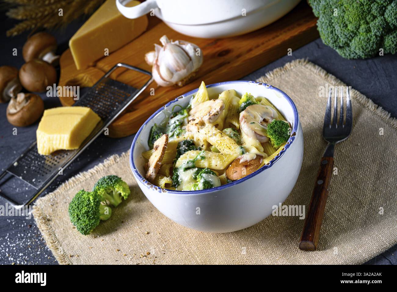Real pasta with mushrooms, spinach and broccoli Stock Photo - Alamy