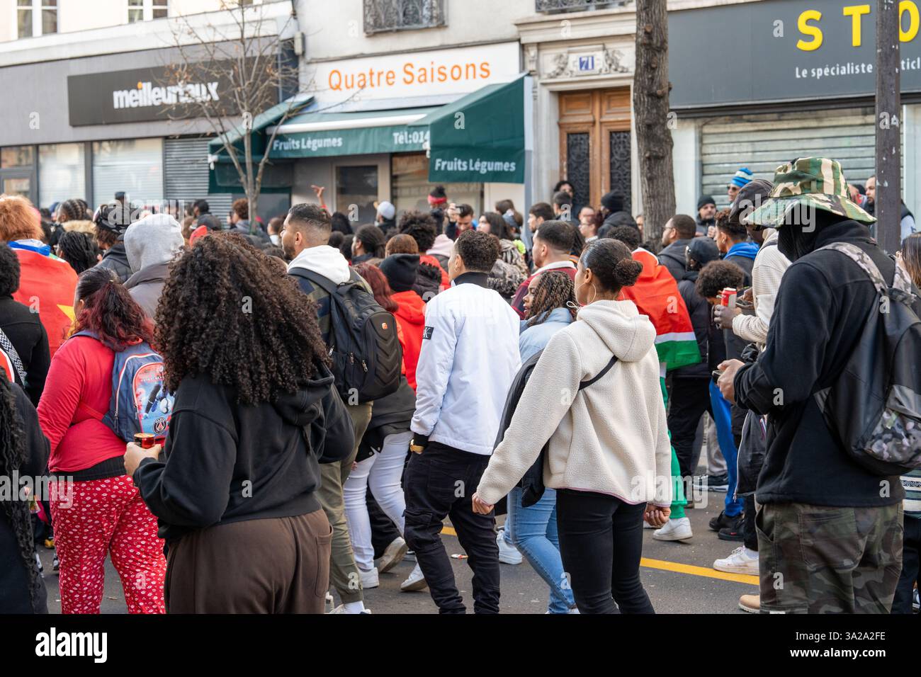 Colorful crowds celebrate at the Paris Carnival 2025, showcasing unity ...