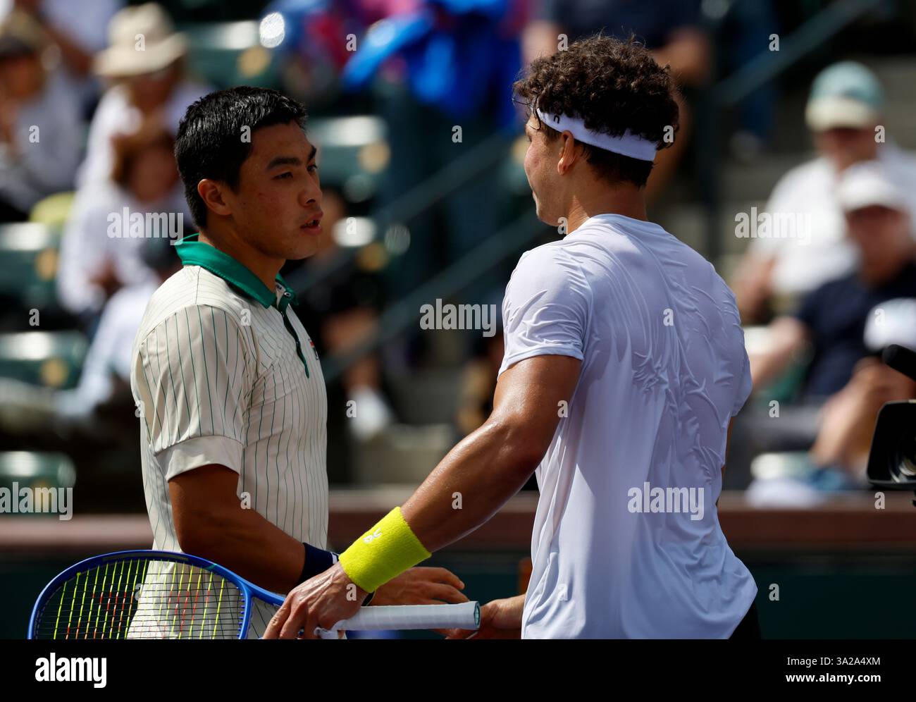March 12, 2025 Brandon Nakashima congratulates Ben Shelton during the ...